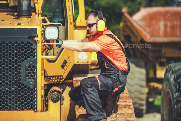 Professional Heavy Duty Machine Mechanic Performing Bulldozer Check ...