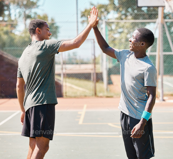 Fitness, high five and men on a basketball court for a game, practice ...