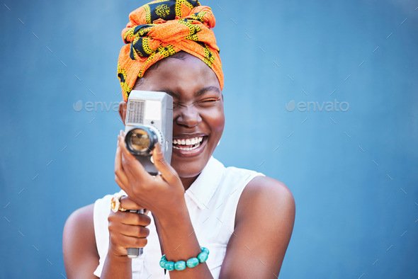 Face, photographer and black woman with camera in studio isolated on a ...