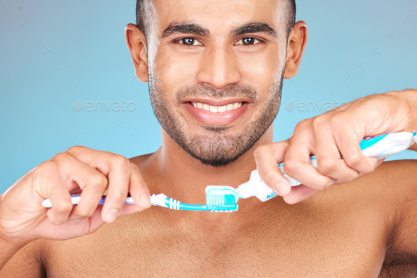 Portrait, man and brushing teeth with toothpaste, toothbrush and dental ...