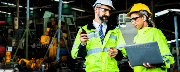 factory worker working with computer, Industrial Engineer in the hard ...