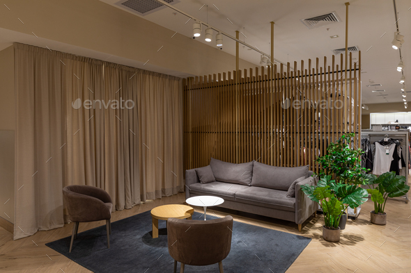 Modern fashionable brand interior of clothing store inside shopping ...