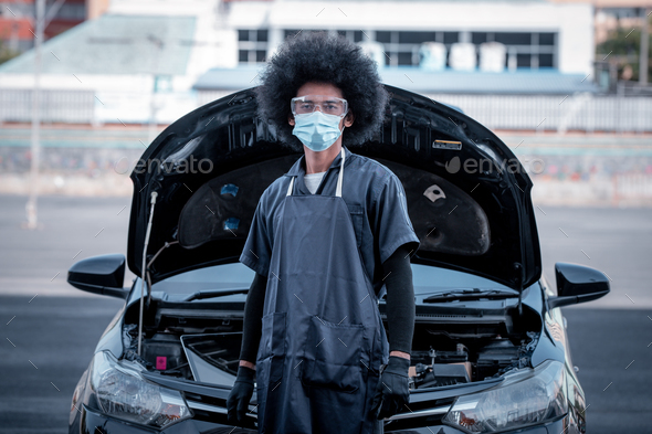 Car mechanic open car hood repairs and check problem system on hand to ...