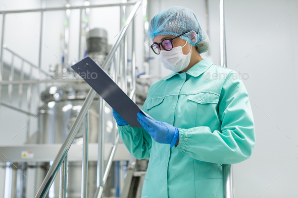plant picture, scientist standing on steel stairs with tablet Stock ...