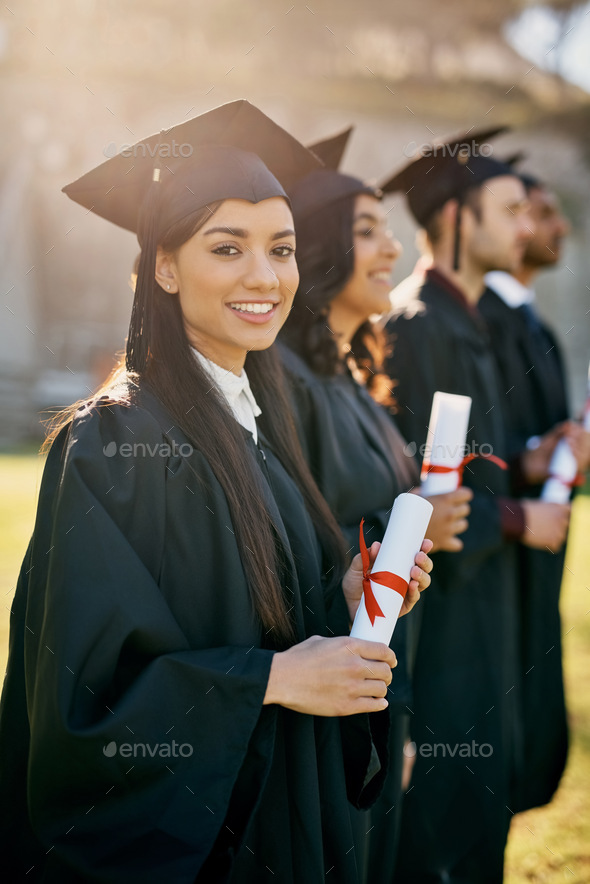 Shot of a group of students standing in a line on graduation day Stock ...