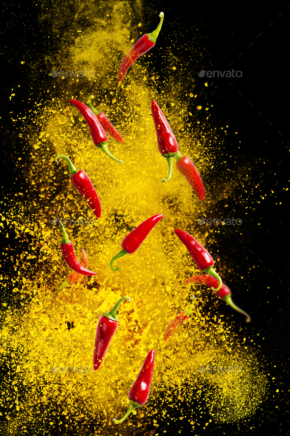Fresh red chilli peppers floating in the air. food levitation. Falling ...
