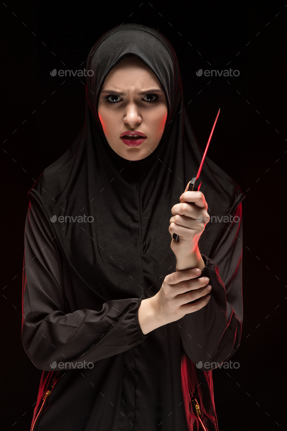 Portrait of beautiful desperate scared frightened young muslim woman ...