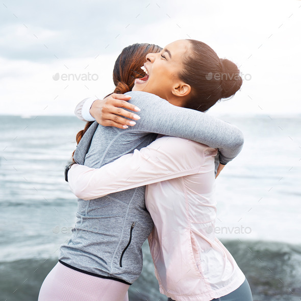 Fitness, friends and hug with women after running workout at beach for ...