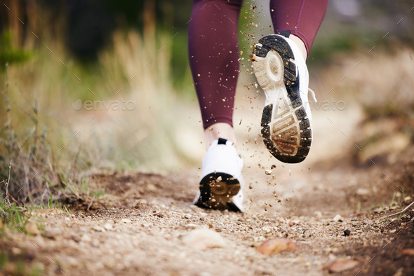 Foot, dirt and running in nature for fitness, exercise and athletic ...