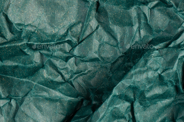 Green crumpled kraft paper. Stock Photo by alisachikov | PhotoDune