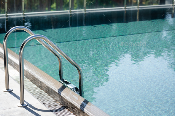 transparent swimming pool with railings on resort during daytime Stock ...