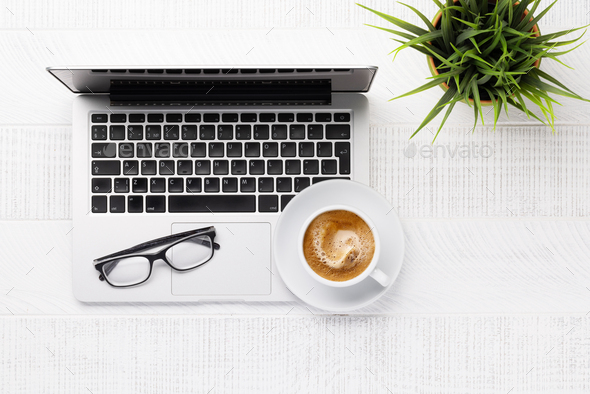 Office desk table with laptop, cup of coffee and supplies Stock Photo ...