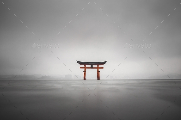 Foggy shot of the floating torii of Miyajima, Japan during rain Stock ...