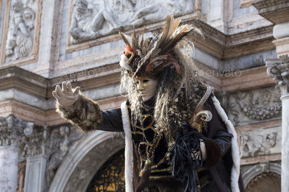 Male in a traditional Venice mask during the world-famous carnival ...