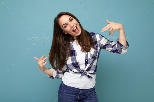 Shot of young positive delightful smiling beautiful brunette woman with ...