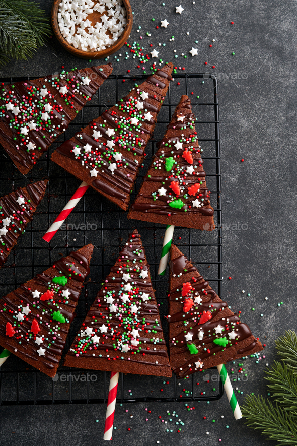 Chocolate brownies Christmas tree with chocolate icing and festive ...