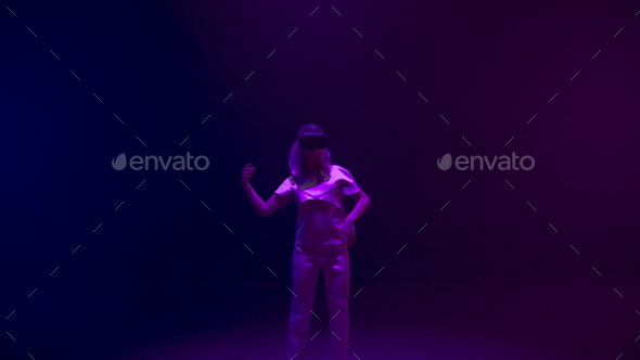 Neon girl dancing vr headset. Energetic teenager enjoying metaverse ...