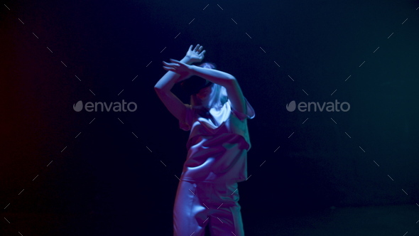 Futuristic woman dancing neon cyberspace in vr glasses. Happy gamer ...