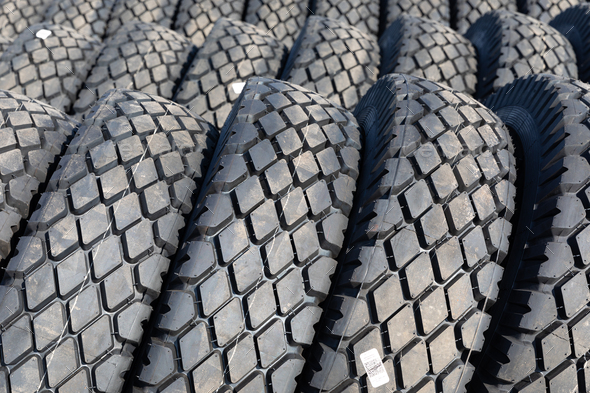 Photo of black big tires on wheels for large cars Stock Photo by ...