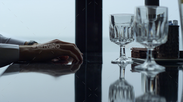 Businessman hands laying served table in restaurant closeup ...