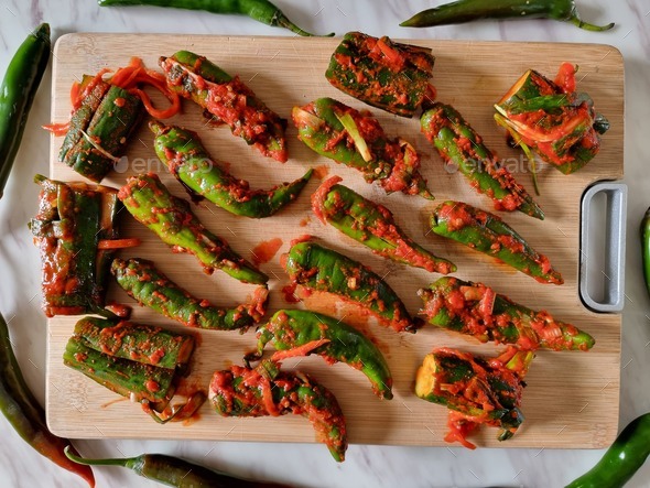 Green chilli pepper kimchi and cucumber kimchi Stock Photo by weewendy