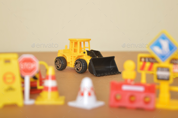 Yellow backhoe loader isolated on a blue background Stock Photo by innu ...