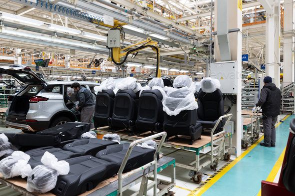 Photo of automobile production line. Modern auto assembly plant. Car ...