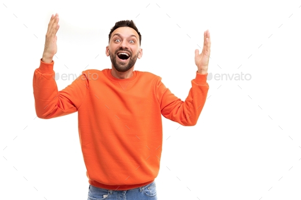 joyful happy man emotionally waving his hands gesturing with open mouth ...