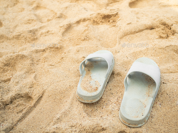 Summer Assessorieses Sandals on Sand Beach Background Stock Photo by ...
