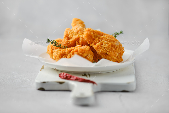 Photo with shallow depth of field of deep fried spicy chicken meat ...