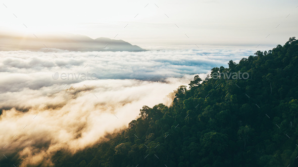 Sea clouds during golden sunrise above the Titiwangsa range mountains ...