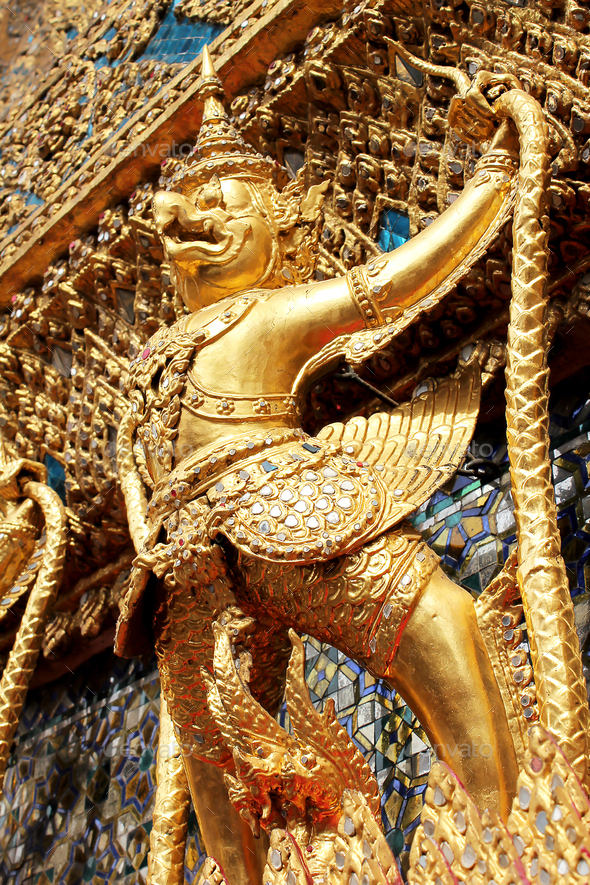 Garuda gold along the wall. Stock Photo by puripatt | PhotoDune