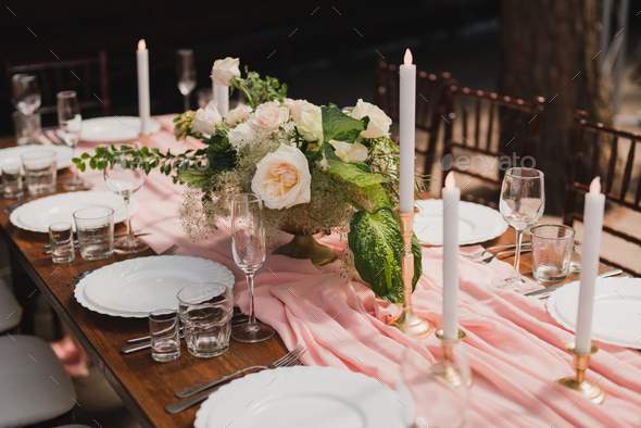 Coziness and style. Modern event design. Table setting at the wedding ...