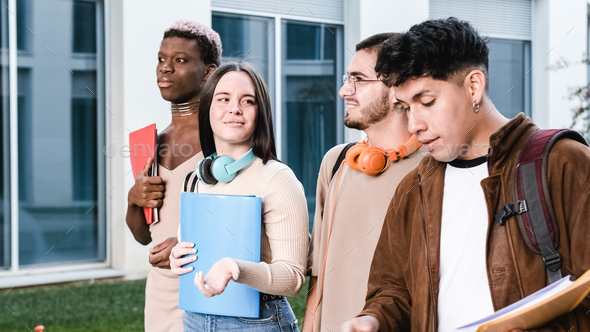 Multiracial students walking and talking Stock Photo by MegiasD | PhotoDune