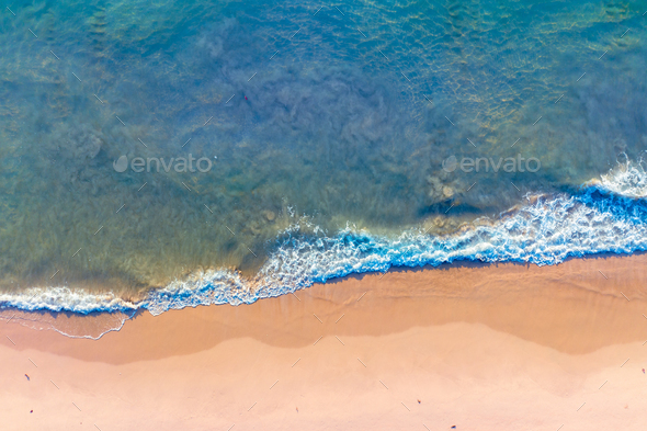 Top view Surface in tropical sea water wave on beach sand Sunset beach ...