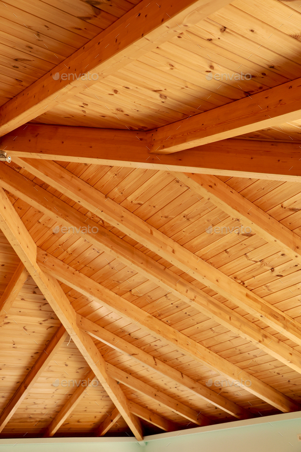 Attic gable ceiling. Wooden mansard construction. Mediterranean house ...