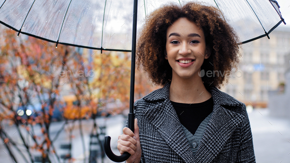 Smiling happy cheerful african american 20s model tourist girl ...