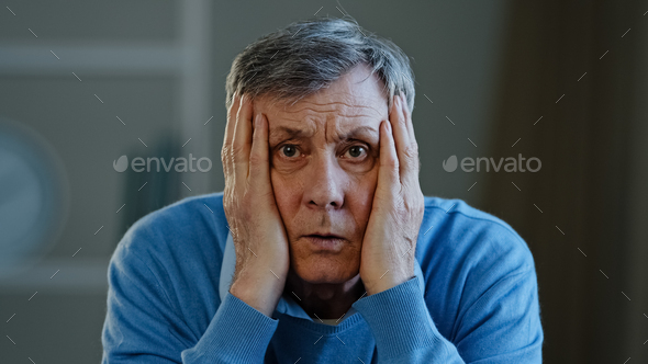 Depressed frustrated old senior Caucasian man shocked sad elderly ...
