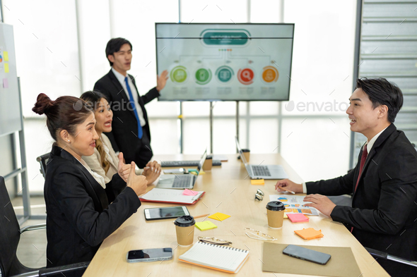 Employee meeting big screen tv presentation conference discussion ...