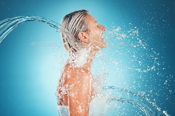Water splash, laughing and model woman happy about wellness, water and ...