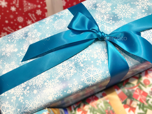 Blue Christmas Gift Box with Blue Ribbon Bow Stock Photo by Leonteena