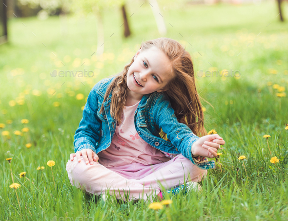 Little girl collecting flowers Stock Photo by tan4ikk | PhotoDune