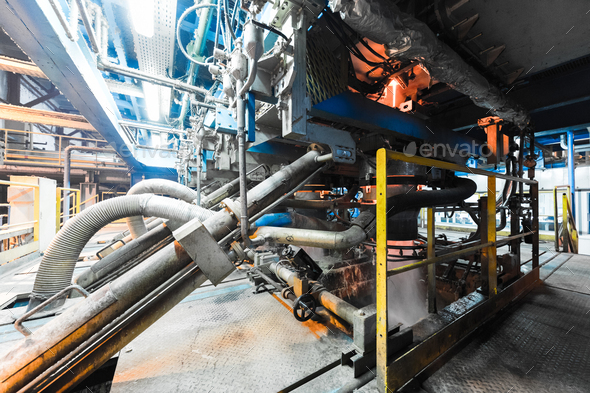 Fiberglass production industry equipment at manufacture background ...