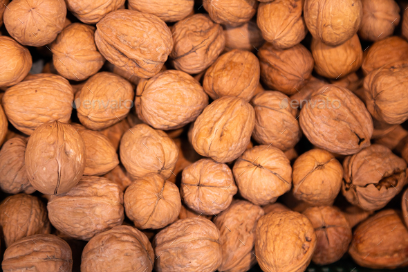 Photo of many walnuts with shells for healthy snack, may be used as ...