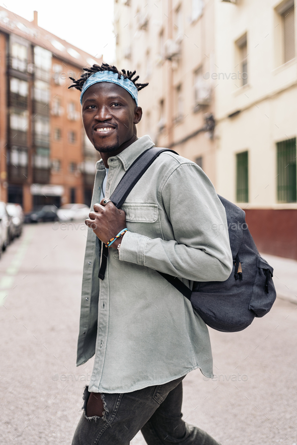 Cheerful African Man in the Street Stock Photo by nunezimage | PhotoDune