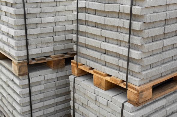 Stack of contemporary stone Paving slabs pavers. Building material on ...