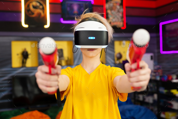 Teen, baby boy playing on a video game console Stock Photo by StudioPeace