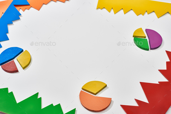 multicolor blocks and pie charts on white background with copy space ...