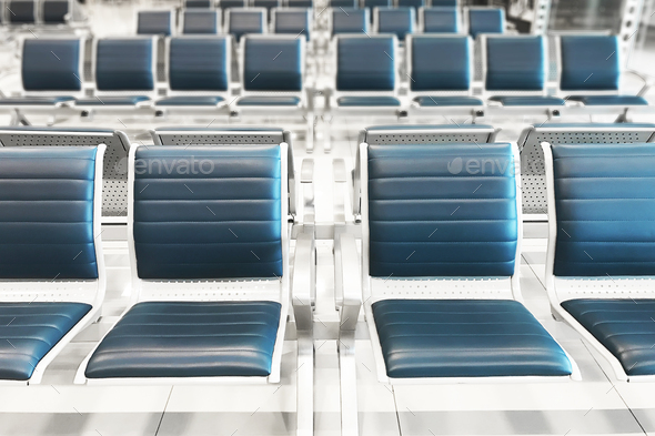 Many Rows of Metal Seats with Blue Leather Stock Photo by Leonteena