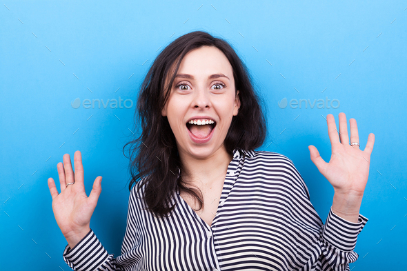 Beautiful young woman smiling with her teeth showing Stock Photo by DC ...